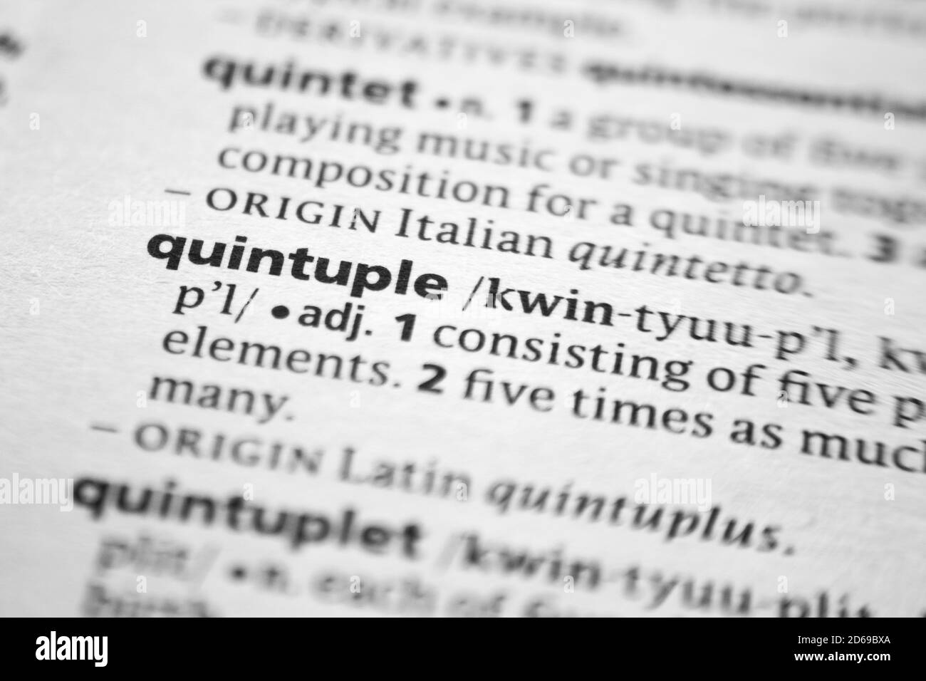 Word or phrase Quintuple in a dictionary Stock Photo - Alamy