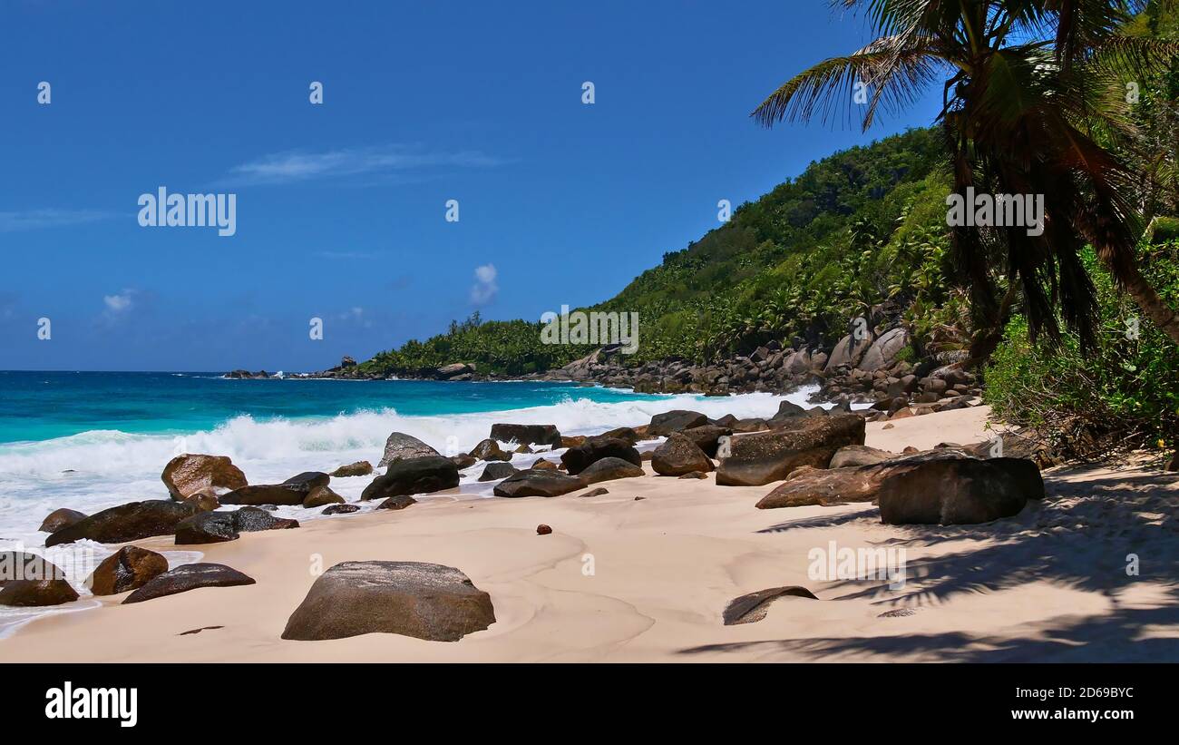 Tropical beach waves hi-res stock photography and images - Alamy