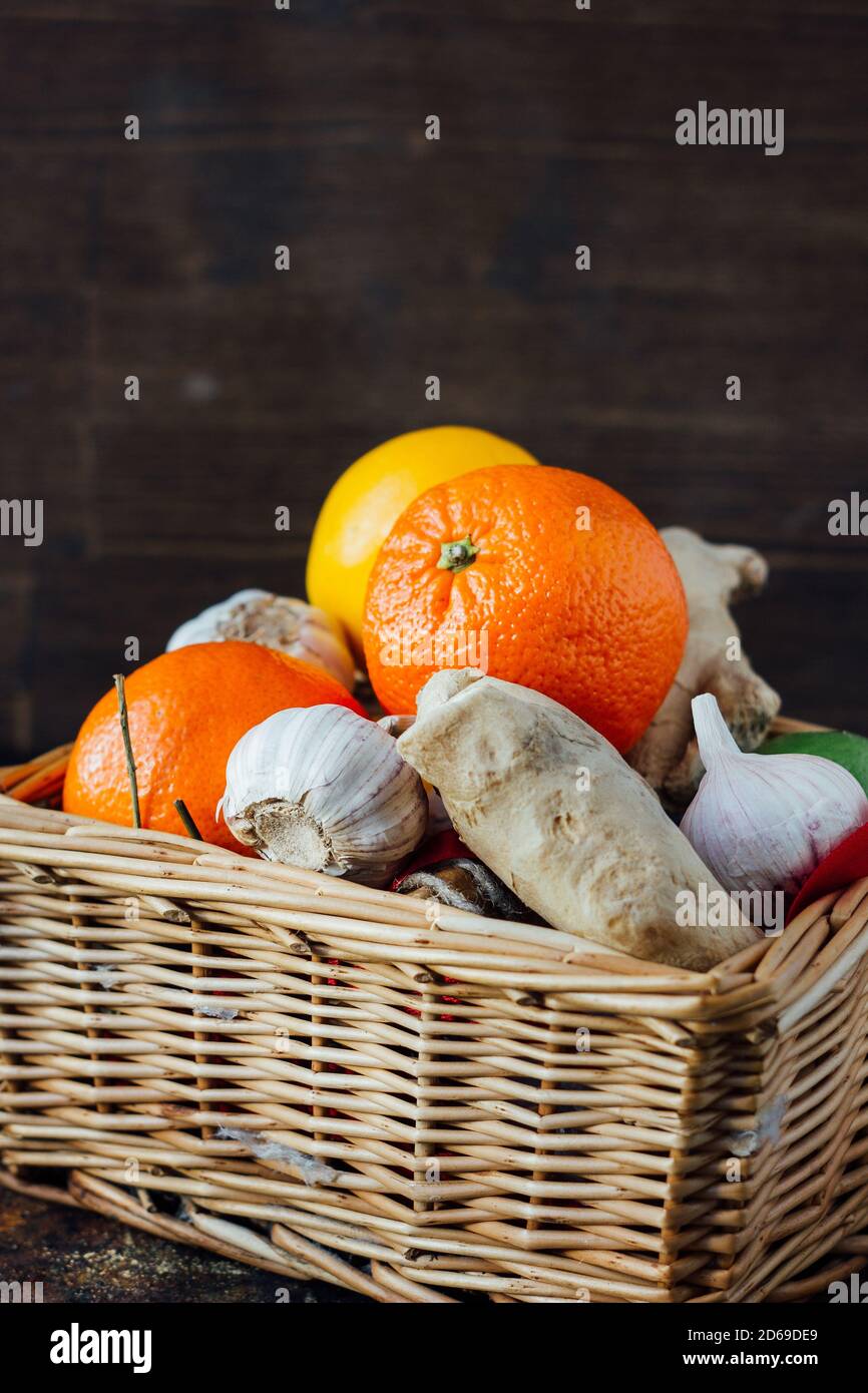 Citrus fruits with ginger roots inside basket Stock Photo - Alamy