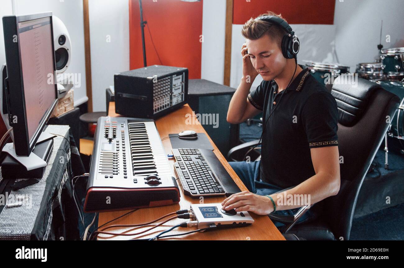 Operator man headphones gear hi-res stock photography and images - Alamy