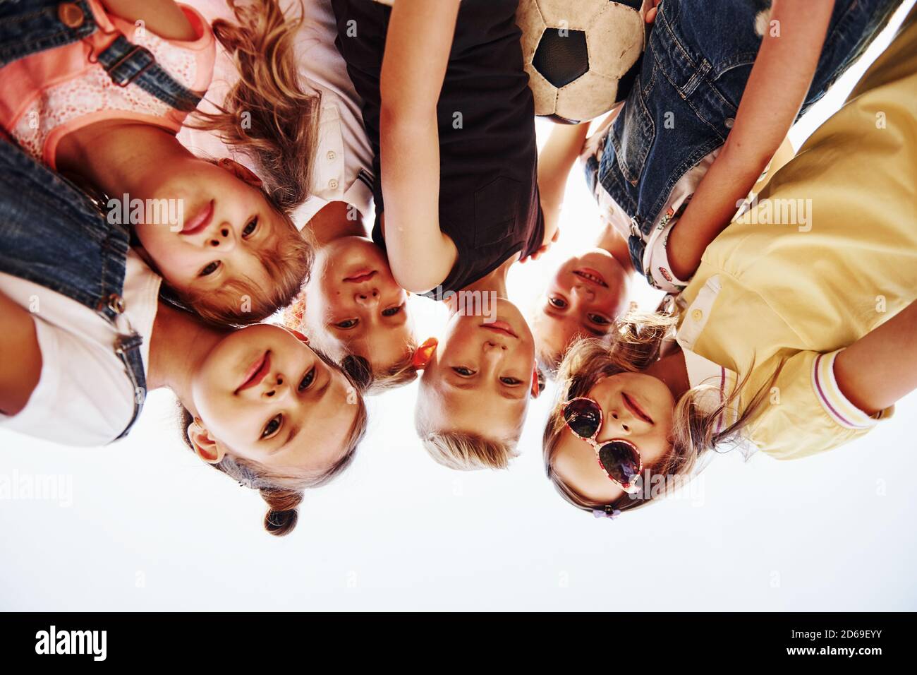 Portrait of kids that standing together and posing for the camera Stock ...