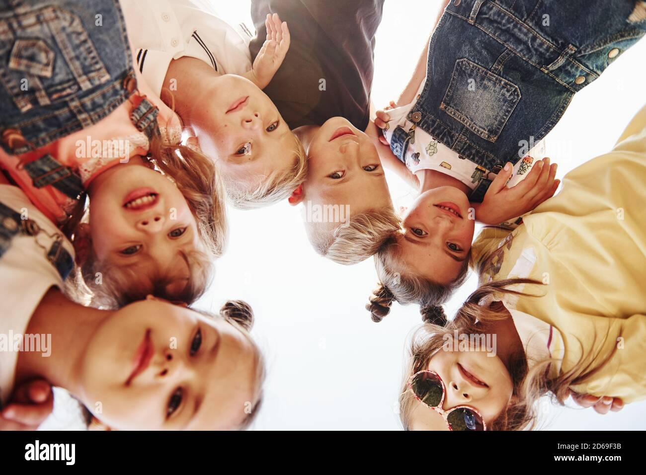 Portrait of kids that standing together and posing for the camera Stock ...