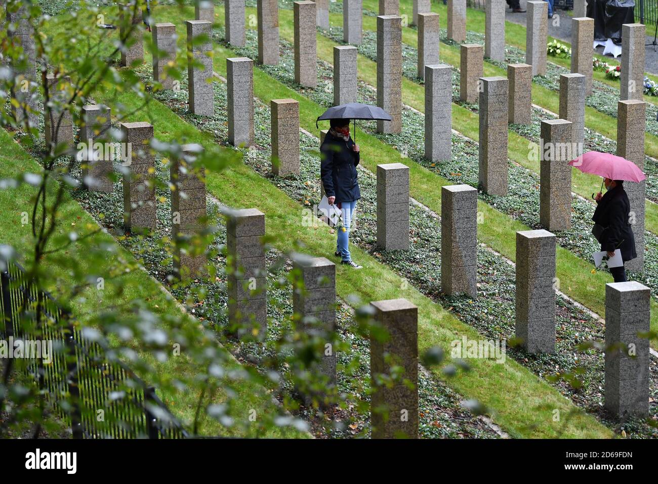 Berga An Der Elster, Germany. 15th Oct, 2020. Two women with umbrellas ...
