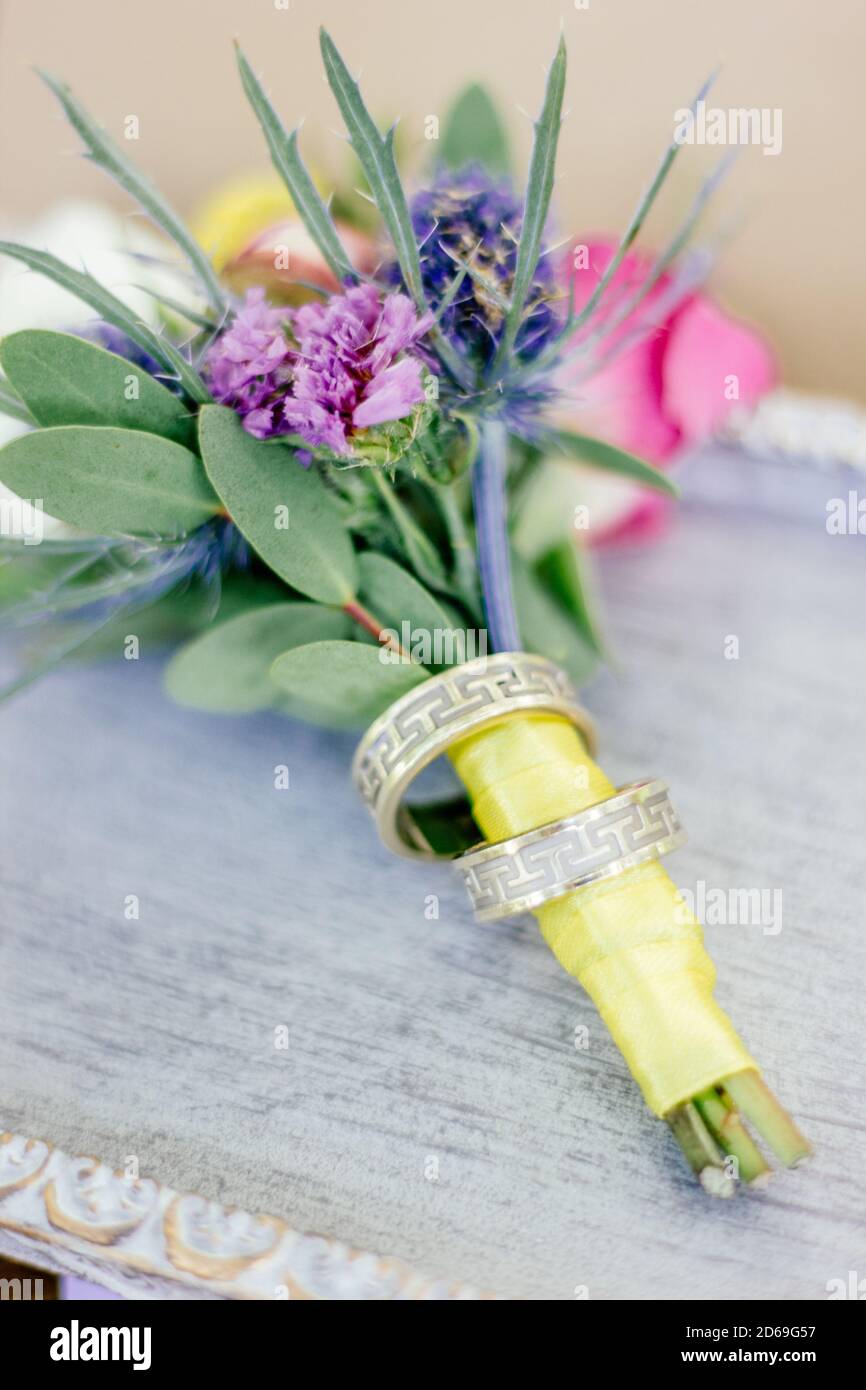 The wedding rings with flowers, marriage concept Stock Photo - Alamy