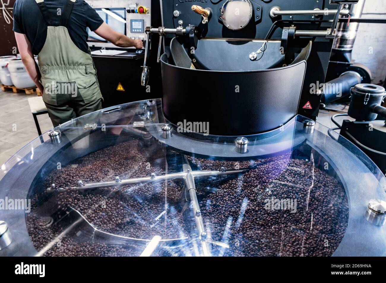 Industrial coffee roasting machine in modern coffee company Stock Photo ...