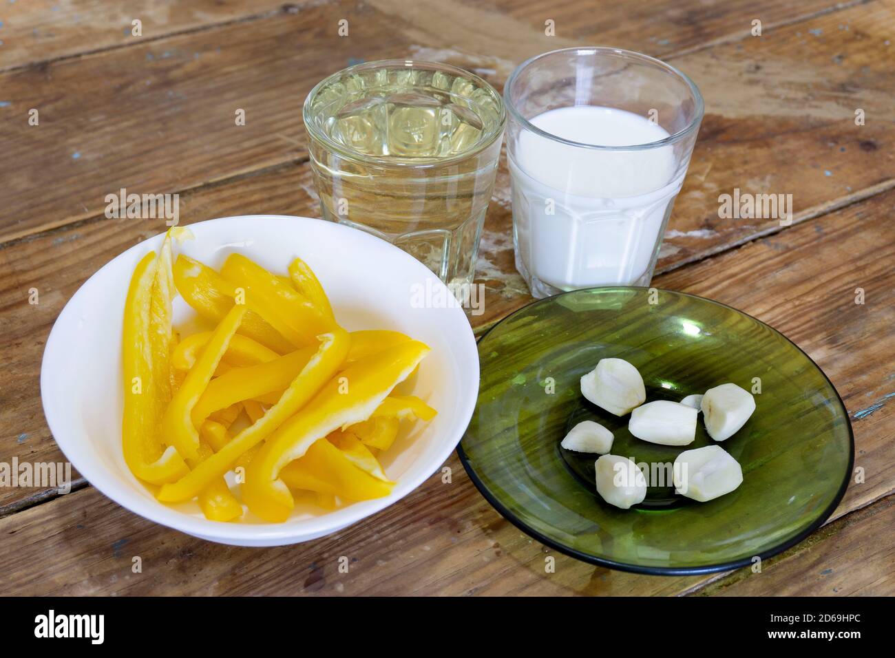 ingredients to prepare yellow pepper mayonnaise Stock Photo - Alamy