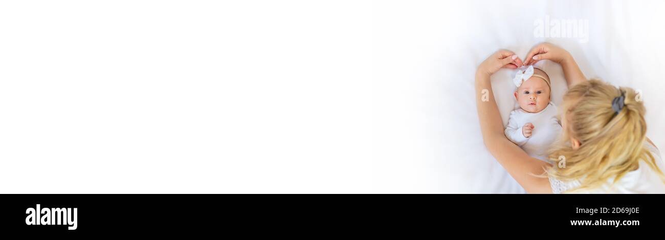 Mom is holding a newborn baby. Selective focus. People Stock Photo - Alamy