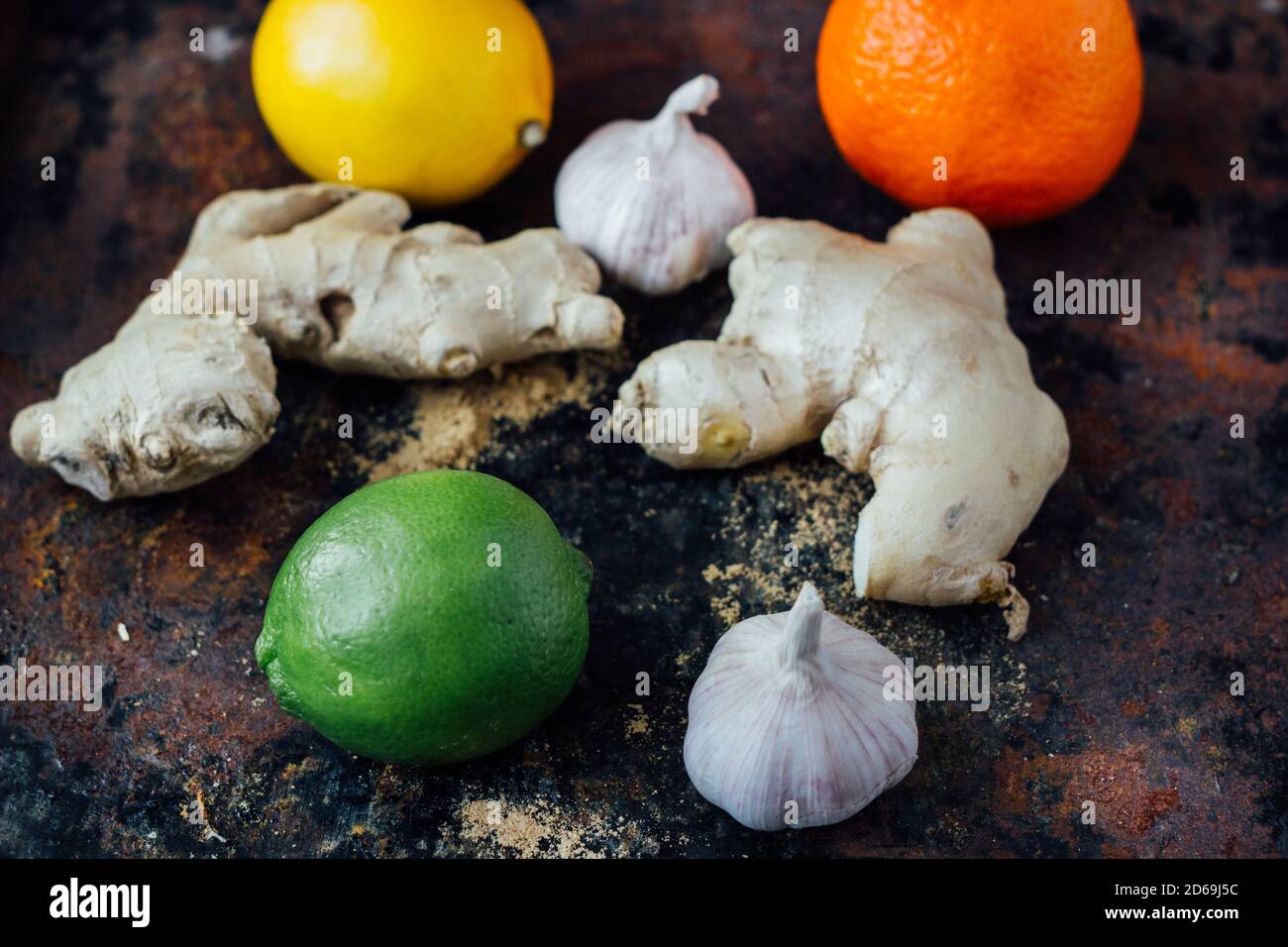 Citrus fruits with garlic and ginger root Stock Photo - Alamy