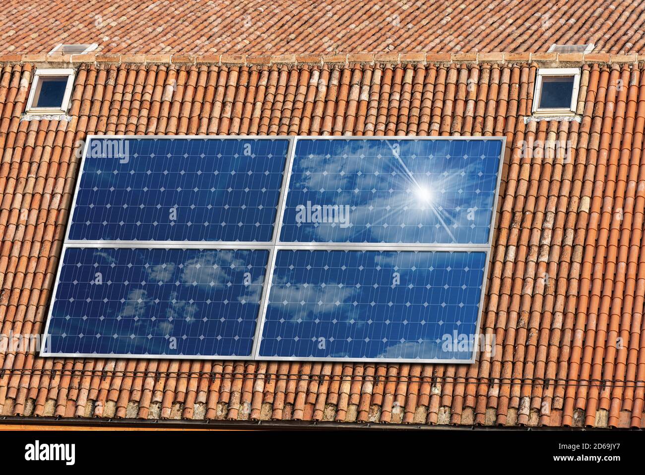 Close-up of a house roof with a solar panels on the top, view from ...