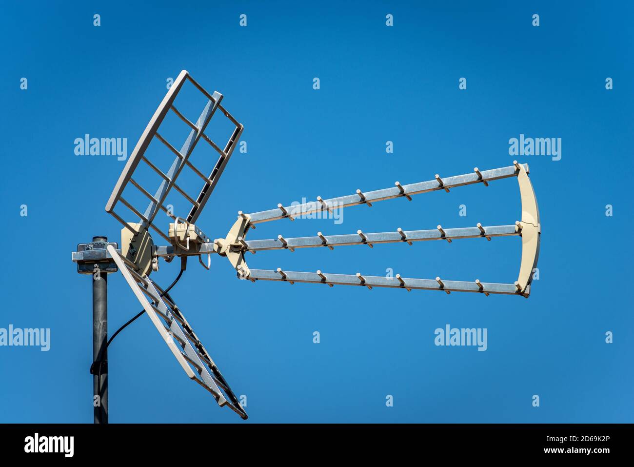 Closeup of a Television Aerial on a Clear Blue Sky with copy space ...