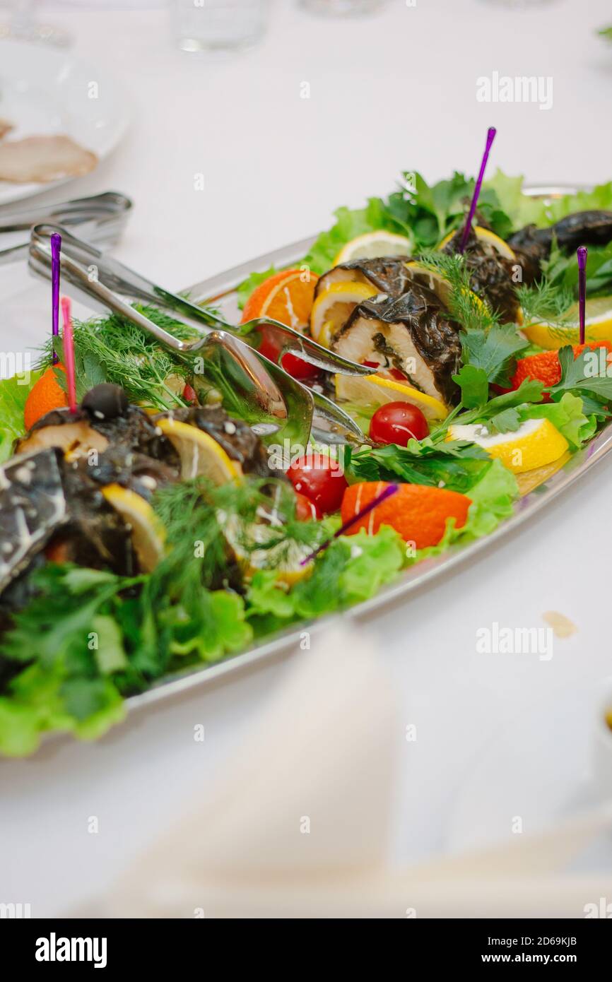 Big fish on table during catering event. Catering buffet Stock Photo ...