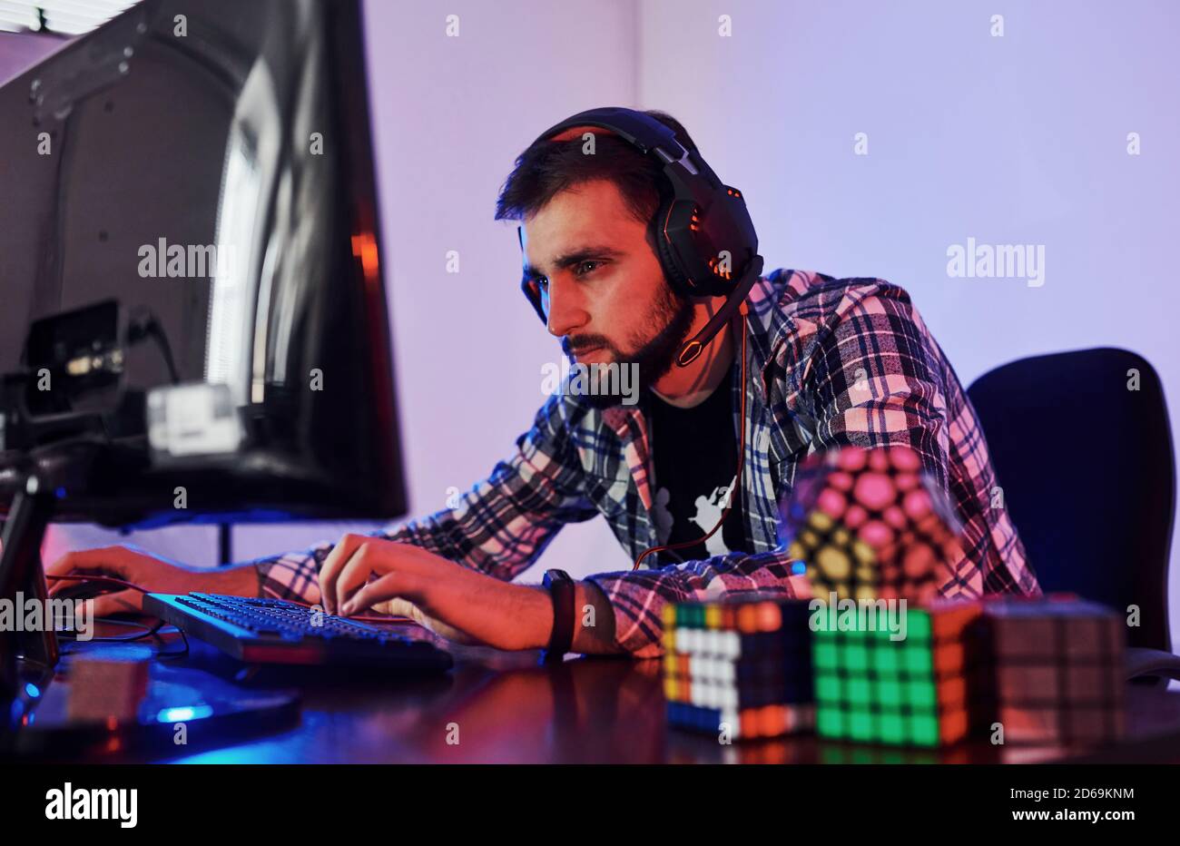 Portrait of young bearded pro gamer playing in online video game Stock ...