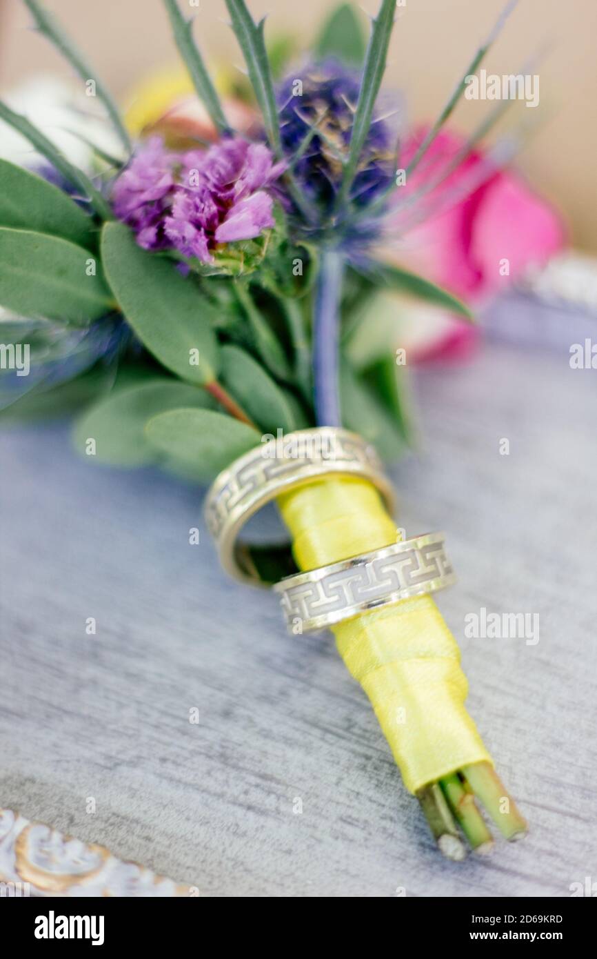 The wedding rings with flowers, marriage concept Stock Photo - Alamy