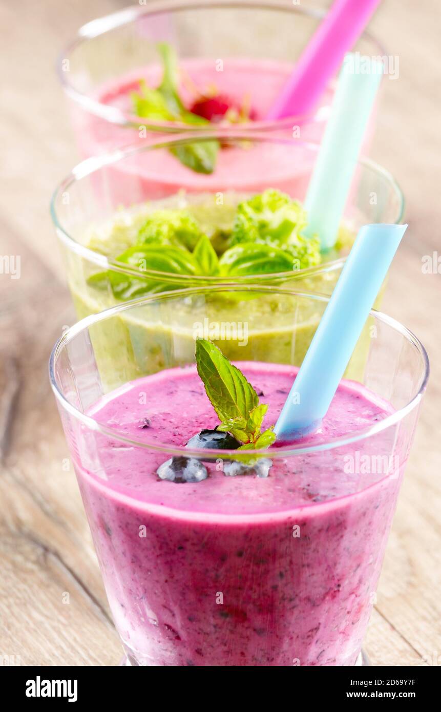Healthy shakes on wooden table. Smoothie concept Stock Photo - Alamy