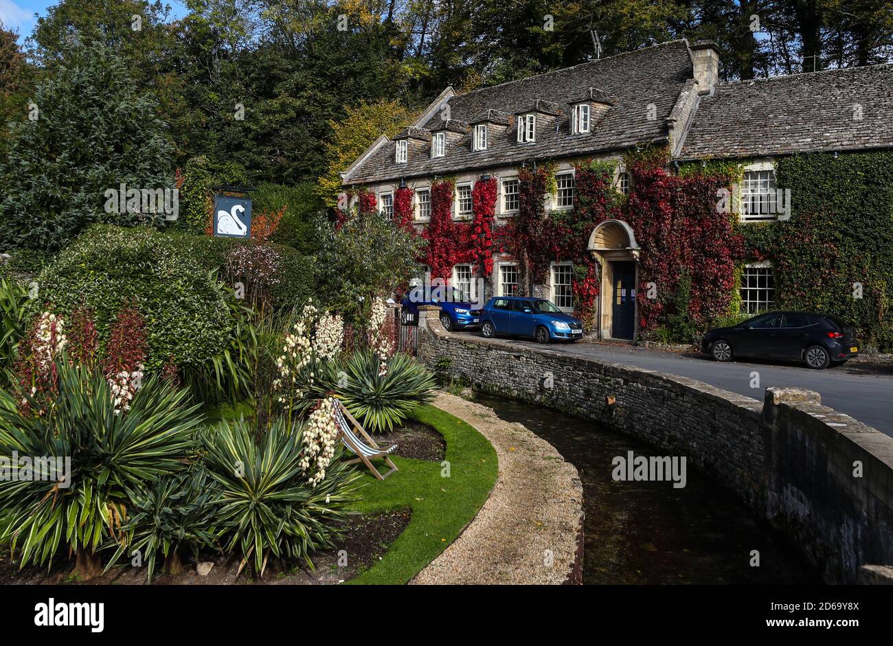 Autumnal colours at the Swan Hotel Bibury in the Cotswolds Stock Photo ...