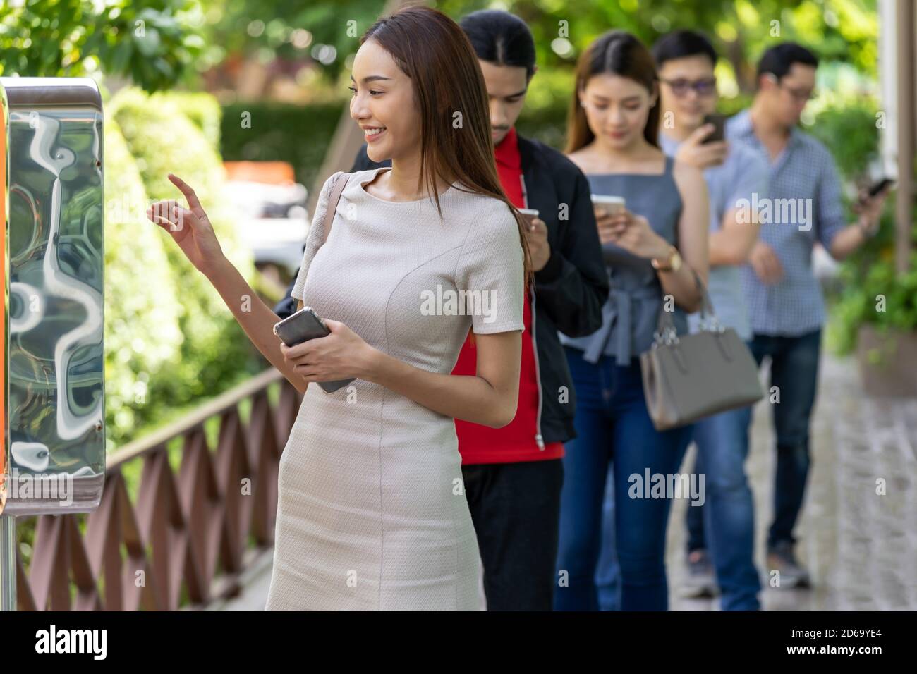 Queue system machine hi-res stock photography and images - Alamy