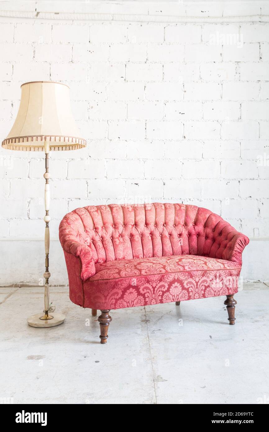 Red sofa couch in vintage room with lamp - classical style Stock Photo ...