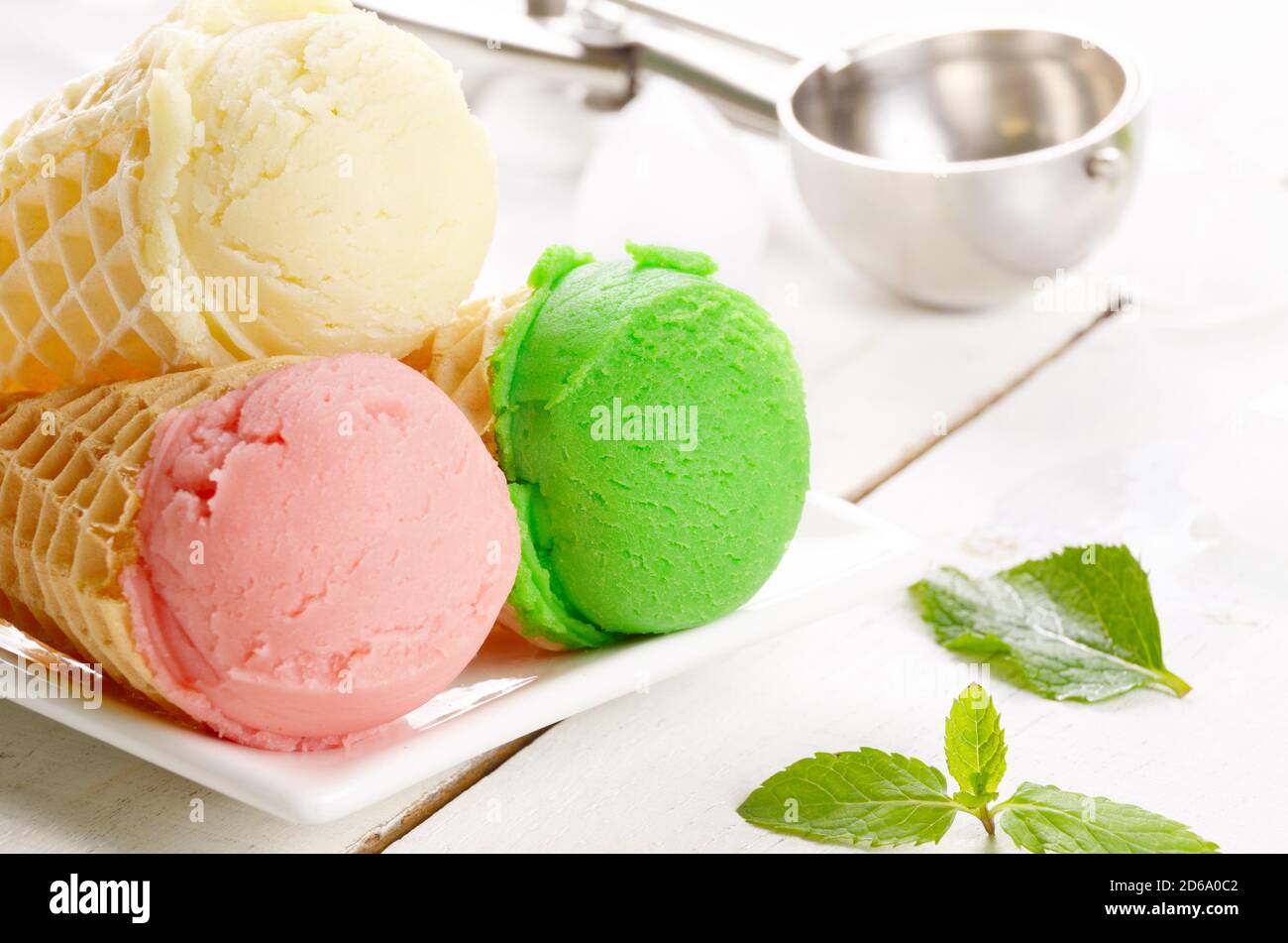 Three scoop ice cream cone hi-res stock photography and images - Alamy