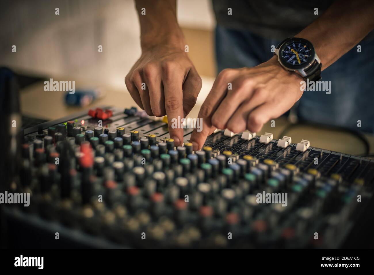 Behind the scene. Sound technician electric engineer adjusting sound ...
