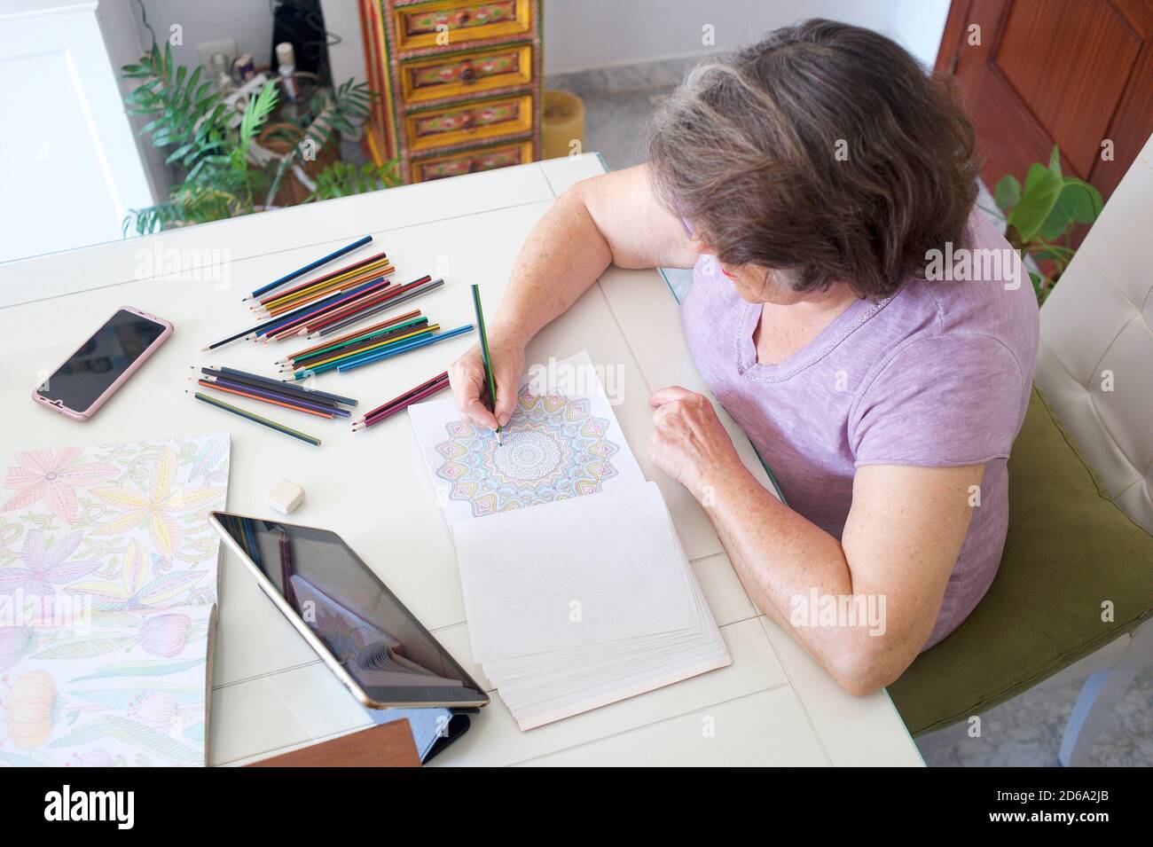 Woman colouring in hi-res stock photography and images - Alamy