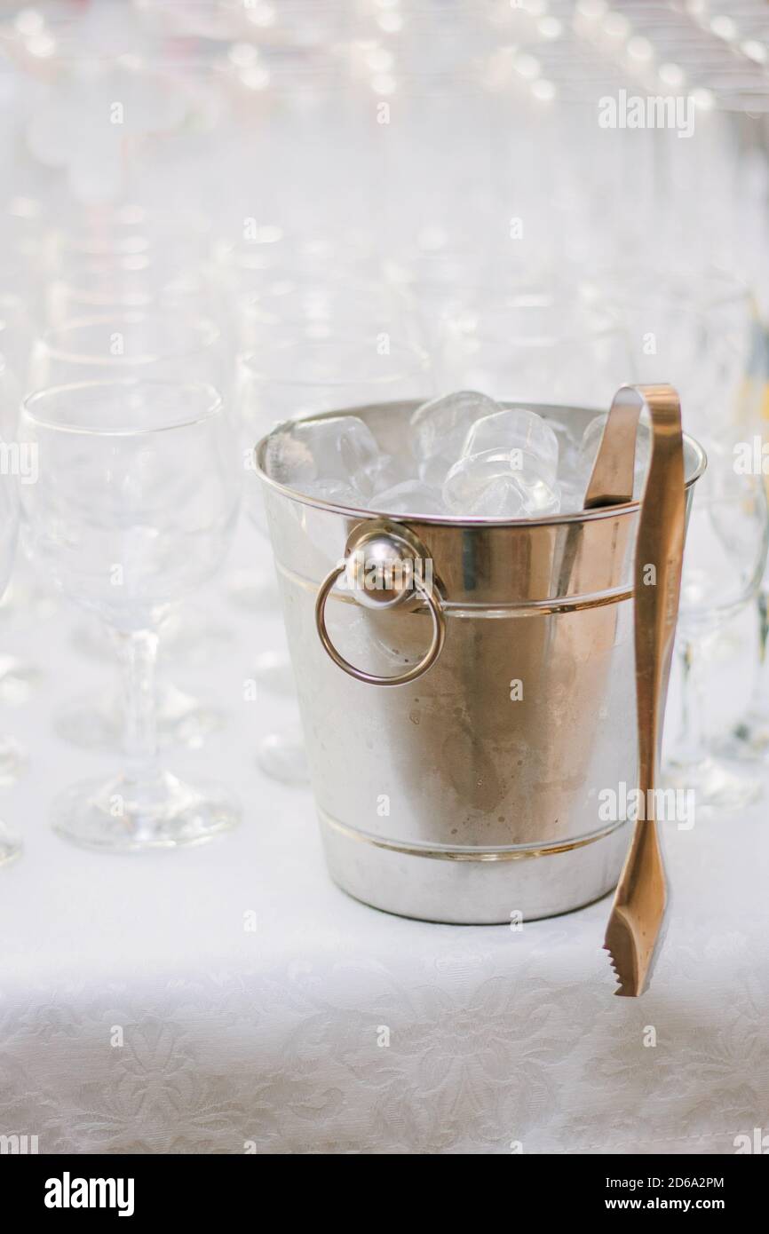 Cold ice in a bucket. Ice Bucket with tranparent cubes of ice Stock ...