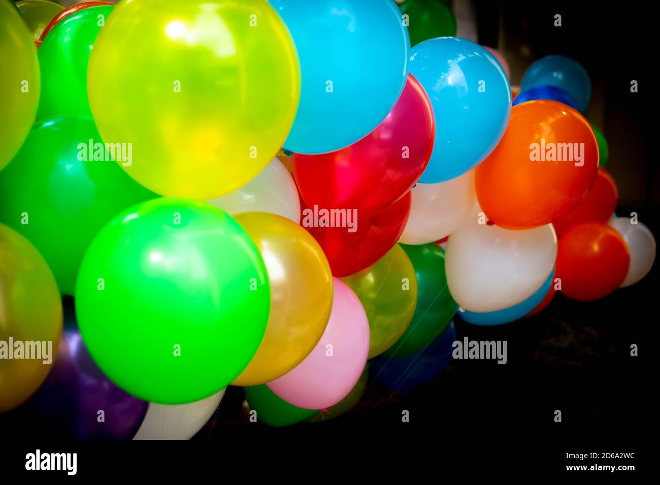 A lot of colorful balloons close-up views. Balloons of many colours ...