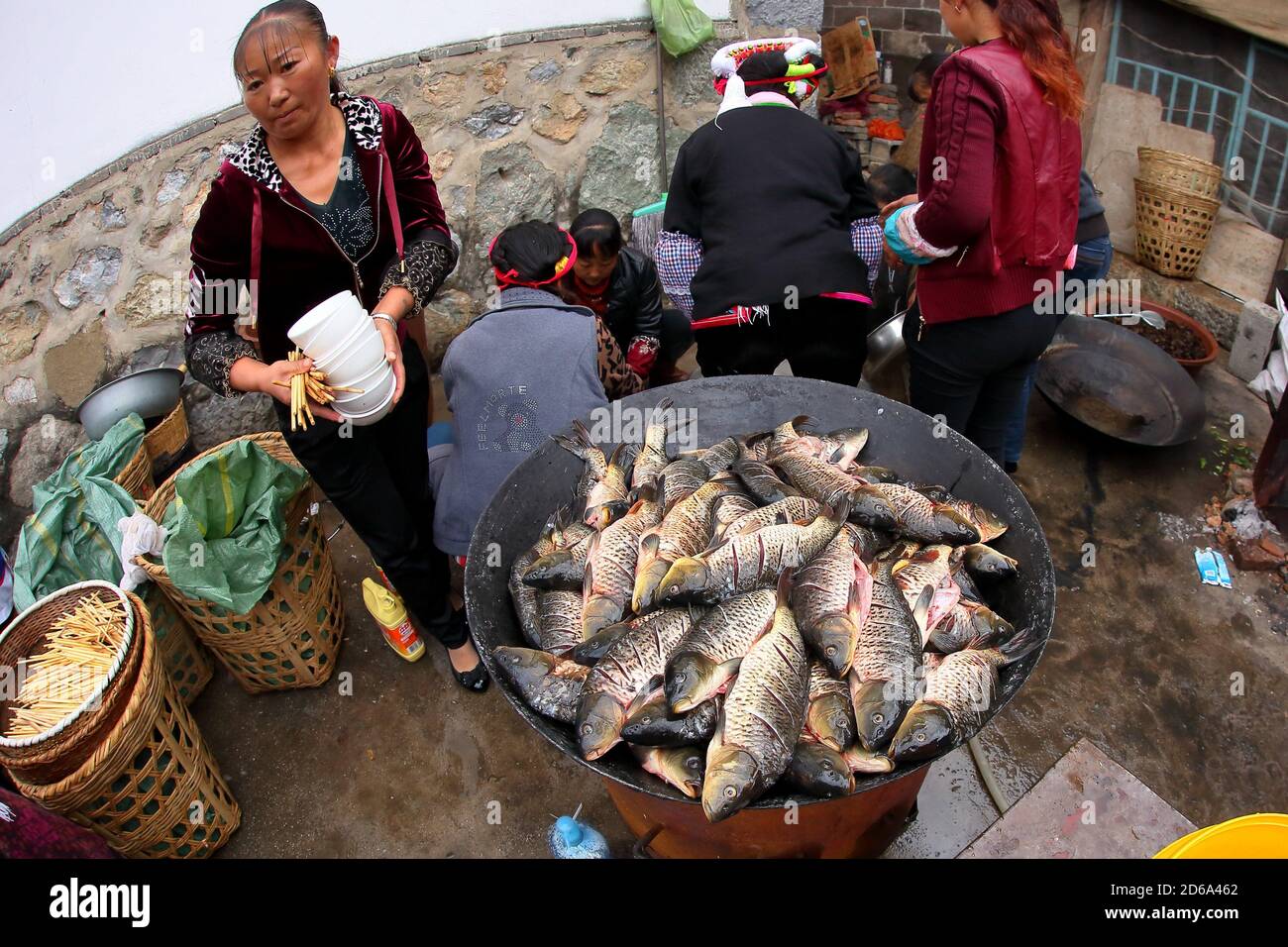 China village cooking fish hi-res stock photography and images - Alamy