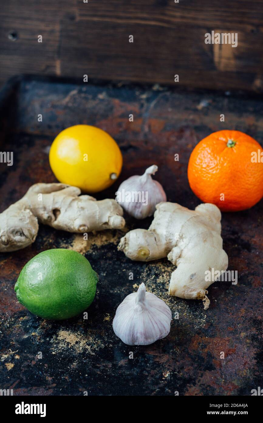 Citrus fruits with garlic and ginger root Stock Photo - Alamy