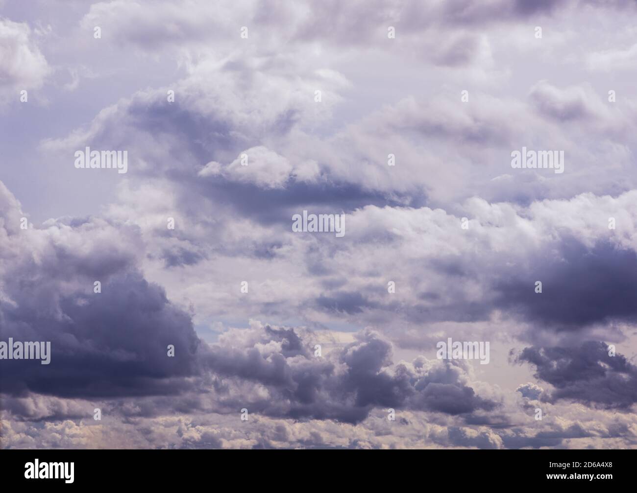 Light and dramatic storm clouds background Stock Photo - Alamy