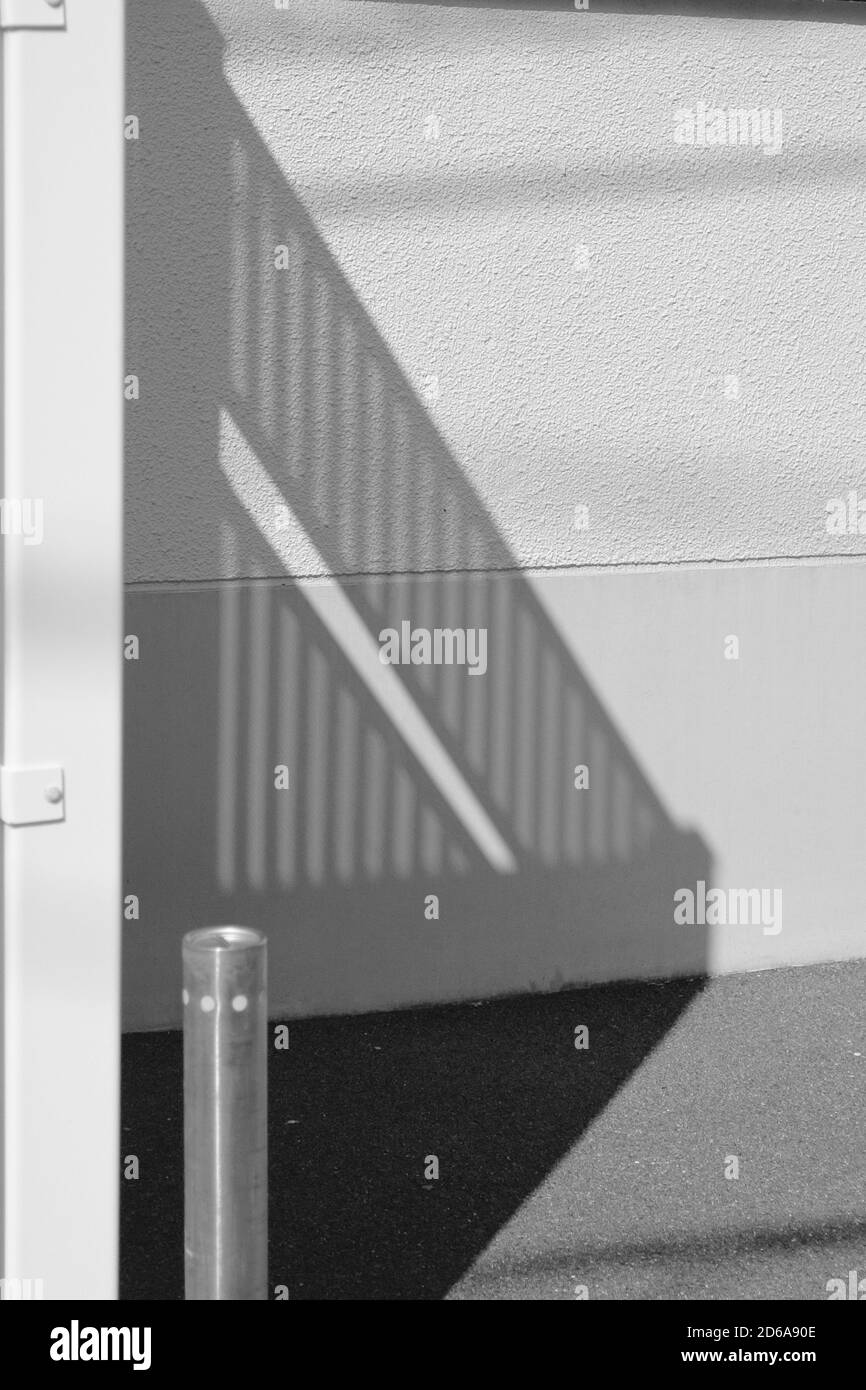 Vertical grayscale shot of shadows on the floor Stock Photo - Alamy