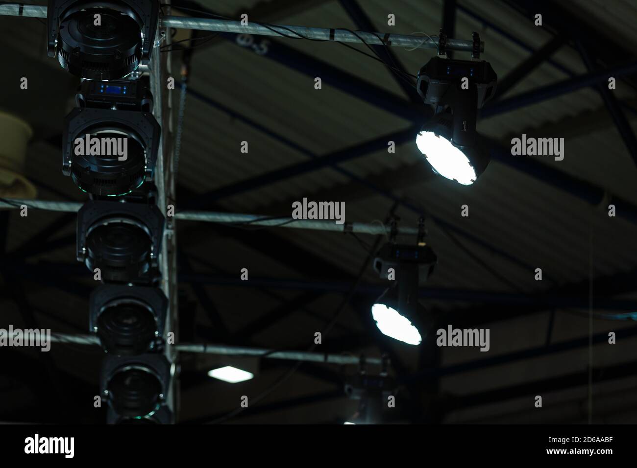 A sign hanging off the side of a building Stock Photo - Alamy