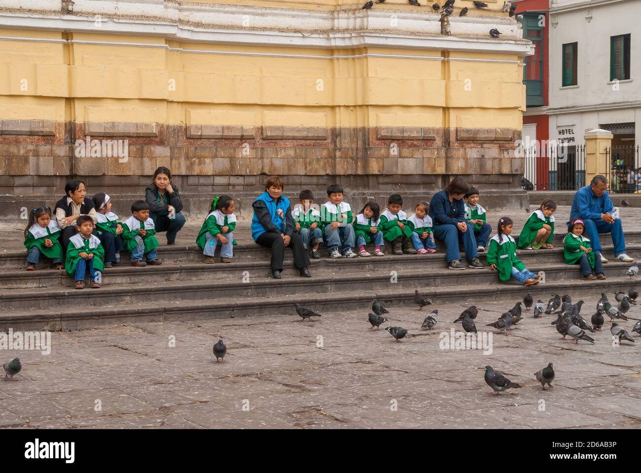 Lima, Peru - December 4, 2008: Group of small children dressed in green ...