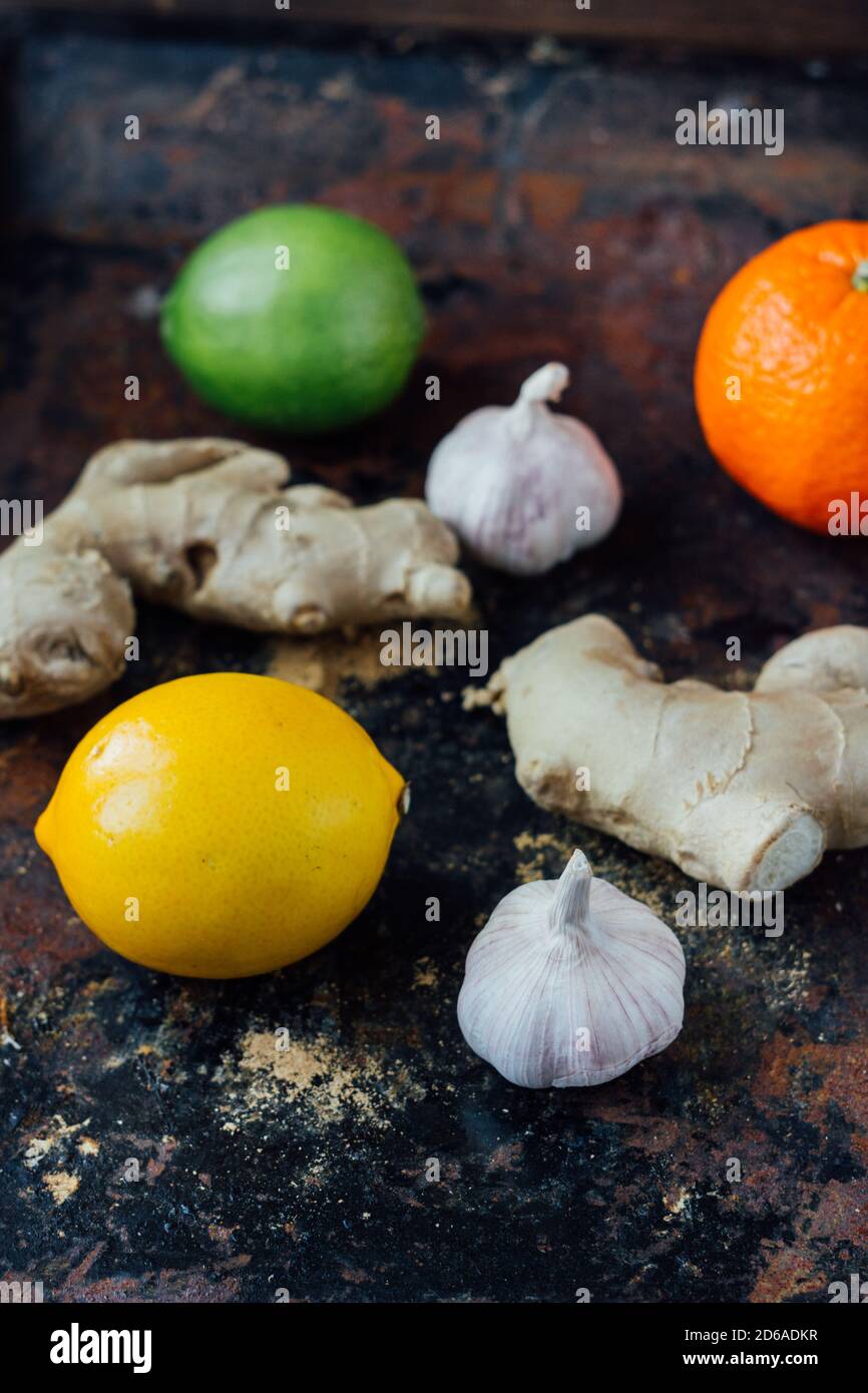 Citrus fruits with garlic and ginger root Stock Photo - Alamy