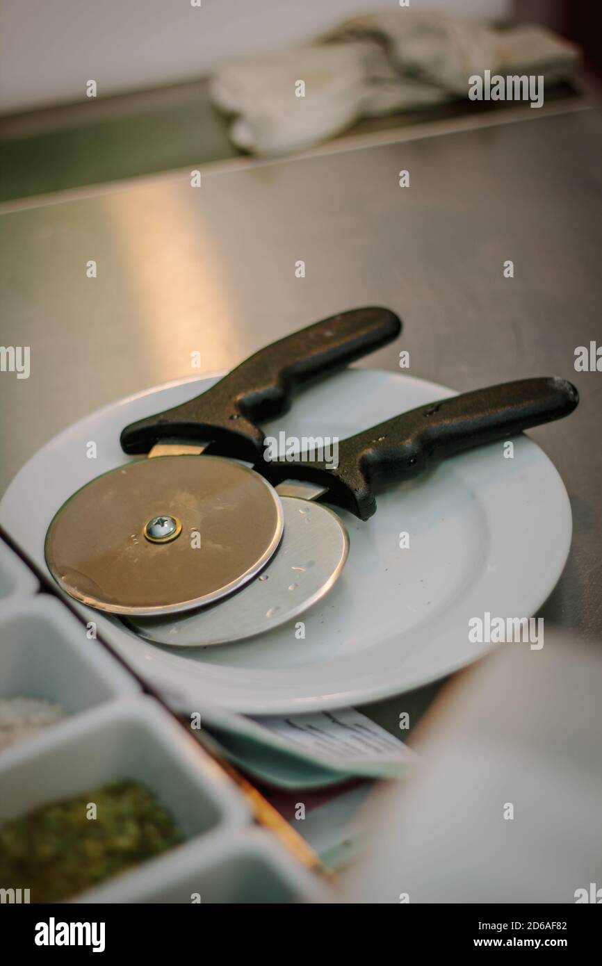 Pizza cutters hi-res stock photography and images - Alamy