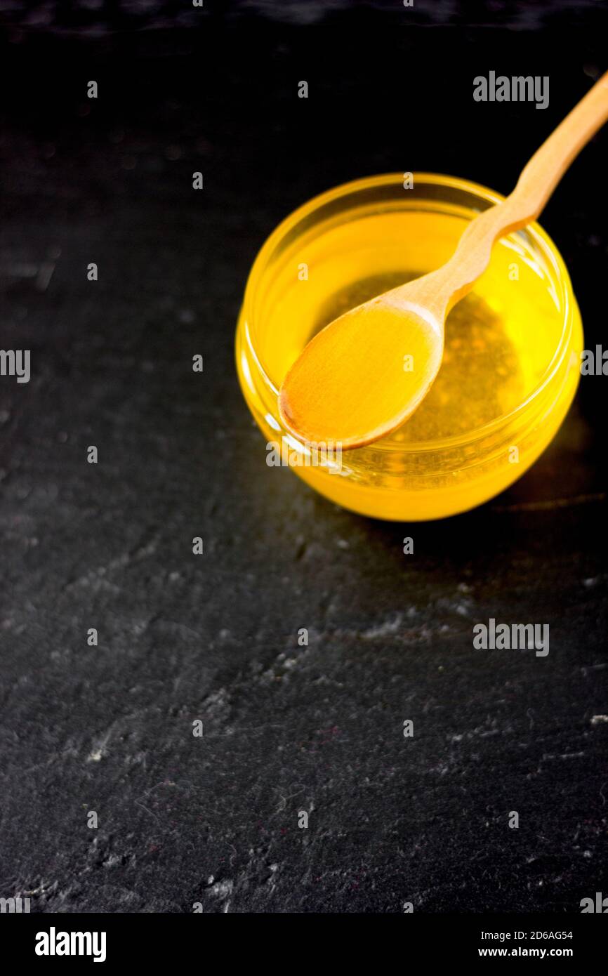 Indian ghee in a transparent glass bowl Stock Photo - Alamy
