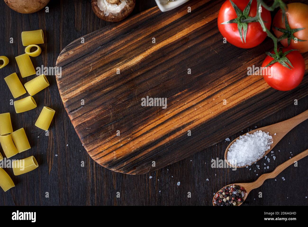 kitchen board with vegetables and spices around. Place for your text ...