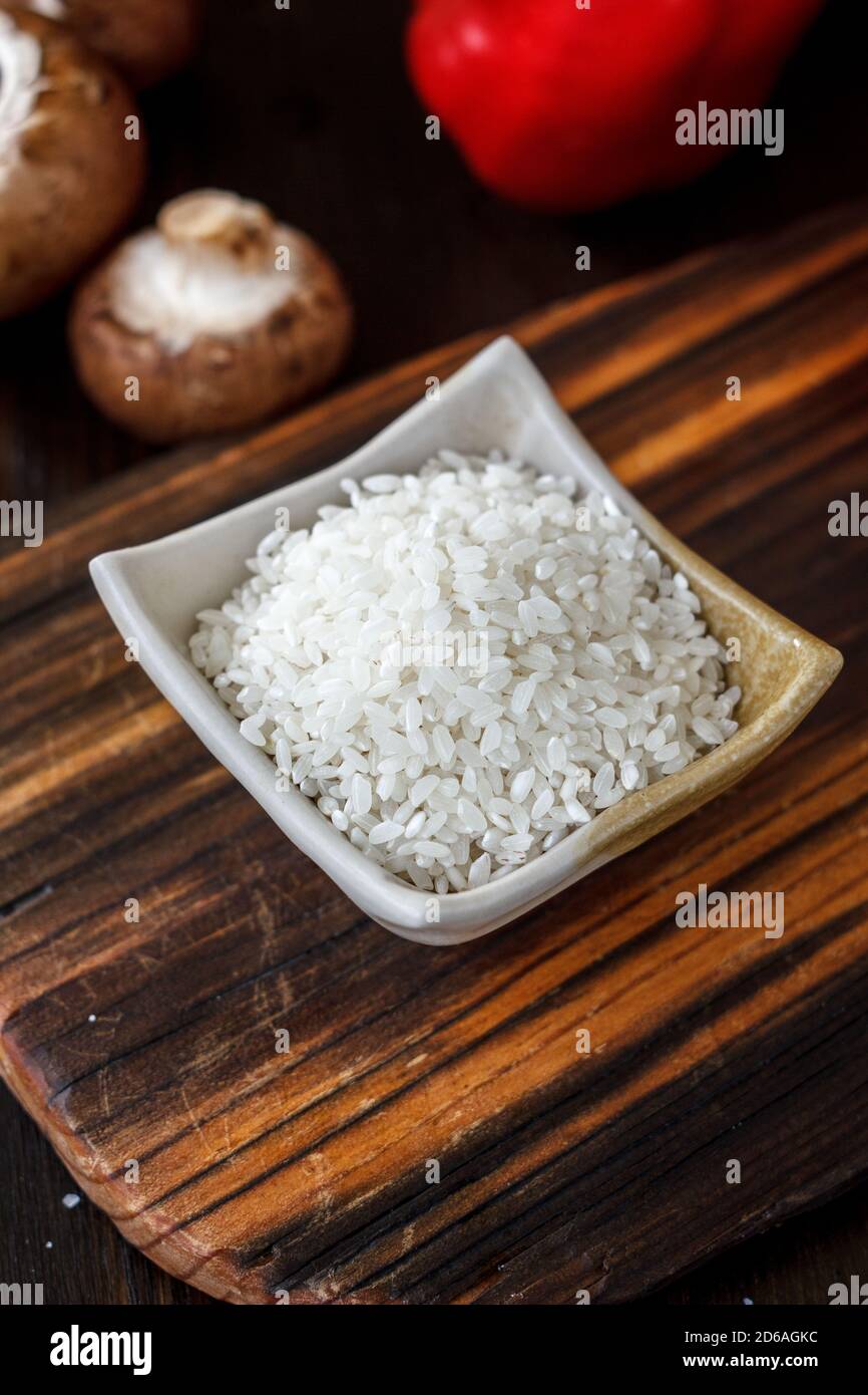 Beautiful white rice in a white ceramic bowl Stock Photo - Alamy