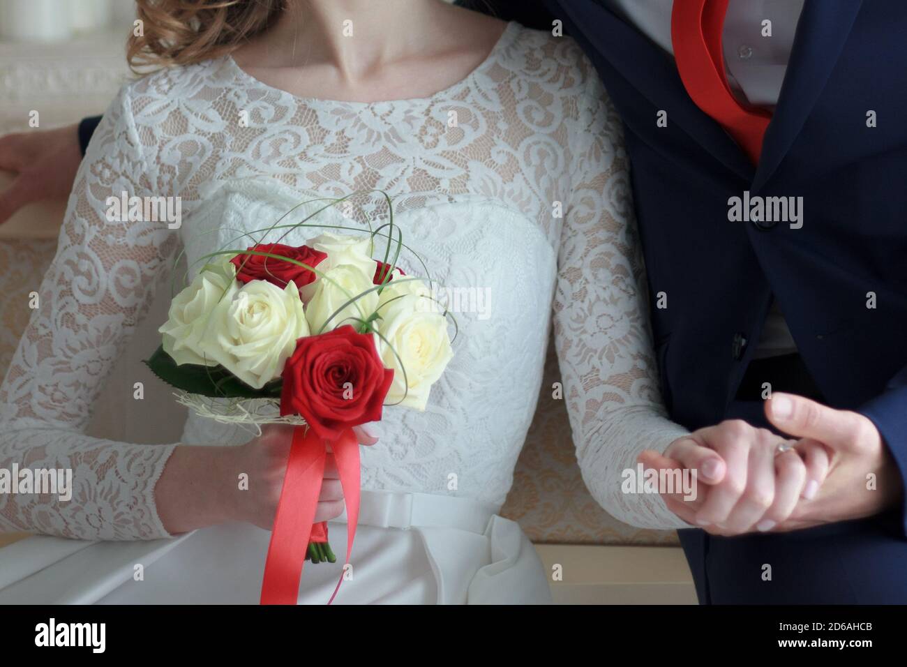 Groom holding bride arm hi-res stock photography and images - Alamy