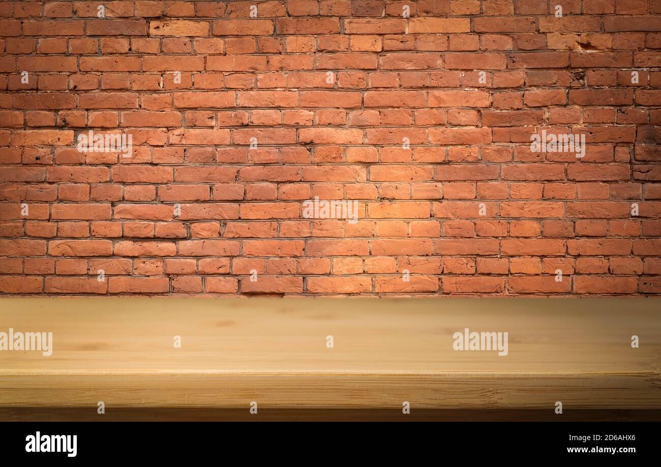 Brick background with a table. Brick wall with empty wooden table Stock ...
