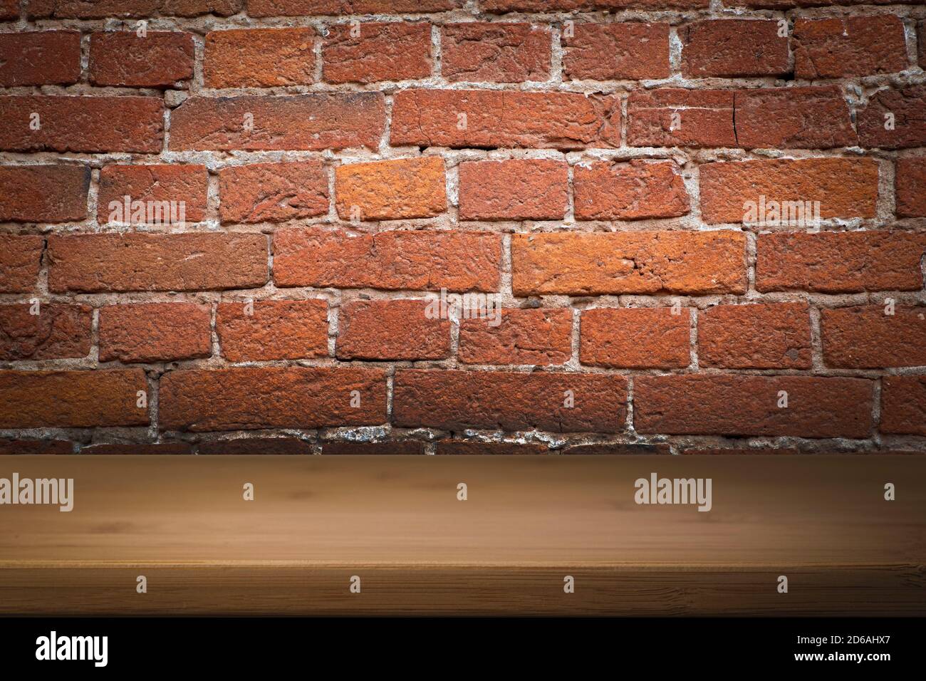 Brick background with a table. Brick wall with empty wooden table Stock ...