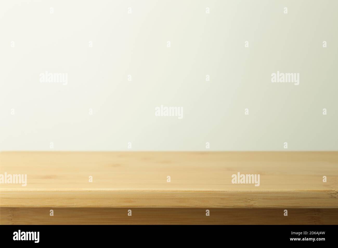 Empty wooden table with white background. Light background with a table ...