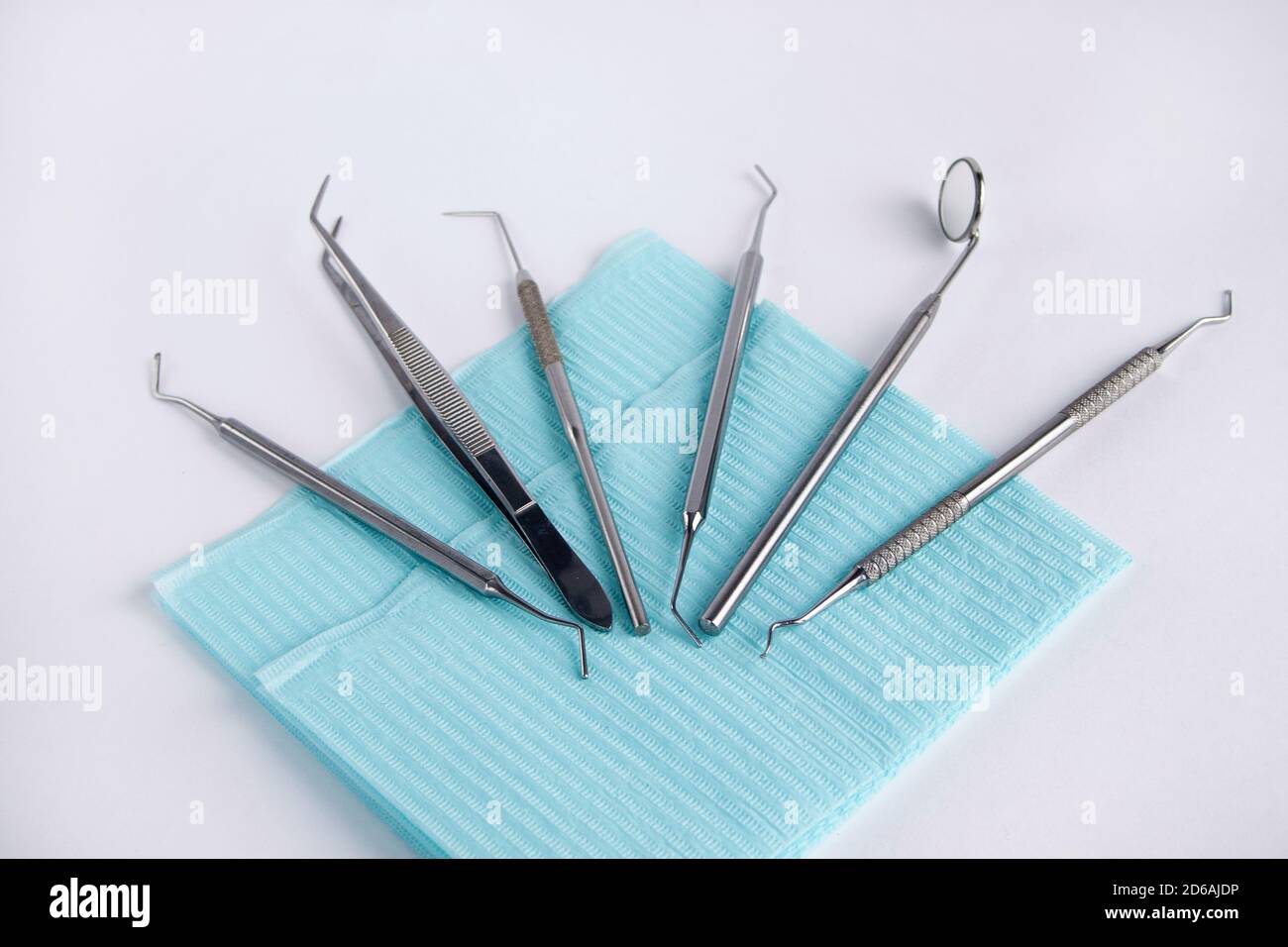 Group of tools and accessories for the dentist. Isolated on white ...