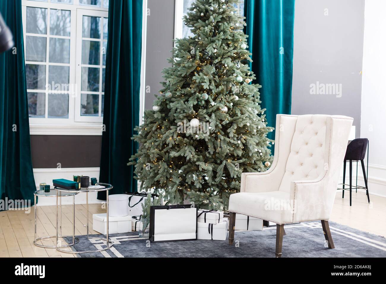 A chair sitting in front of a window Stock Photo - Alamy