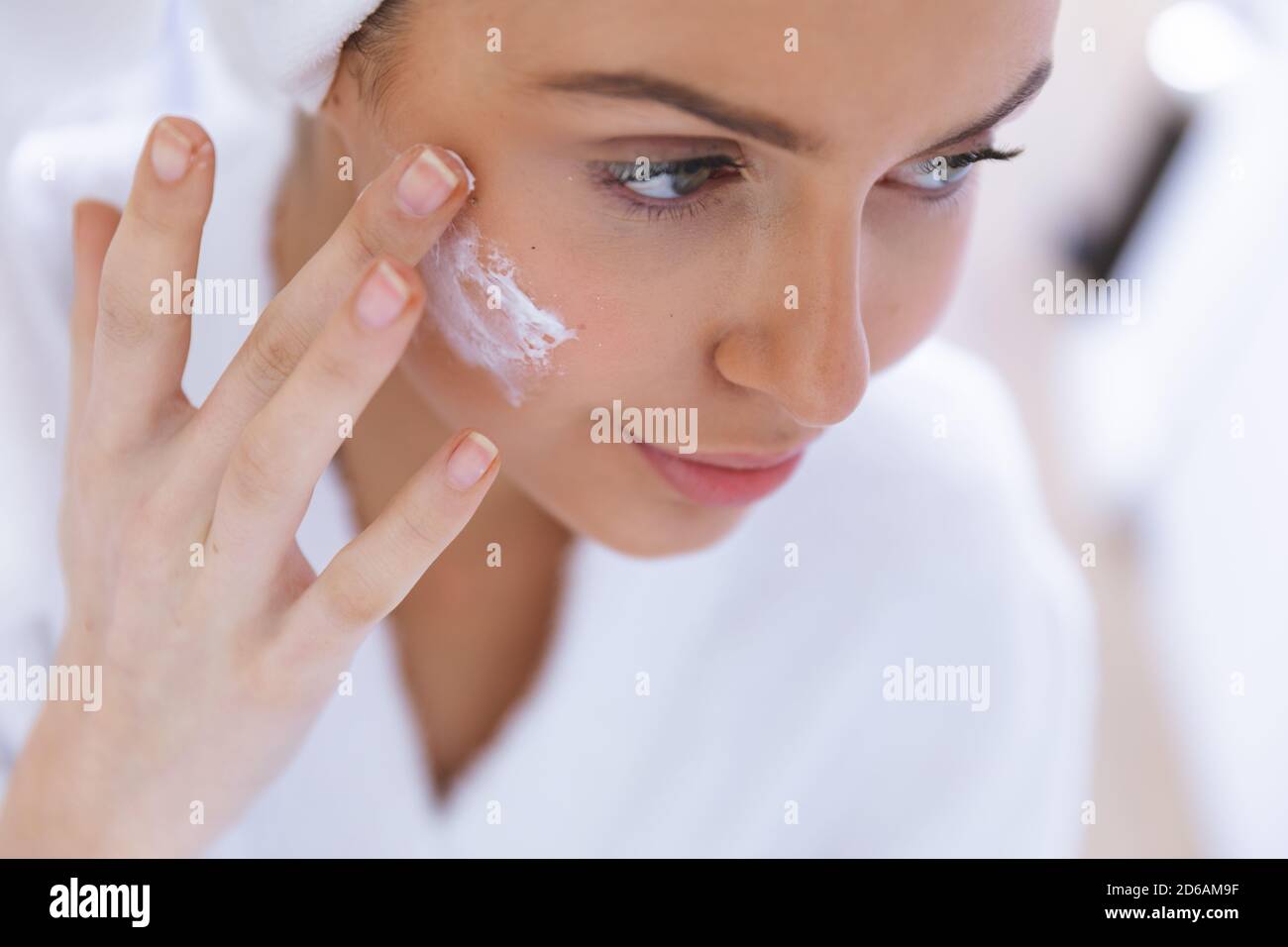 Close up woman applying face hi-res stock photography and images - Alamy