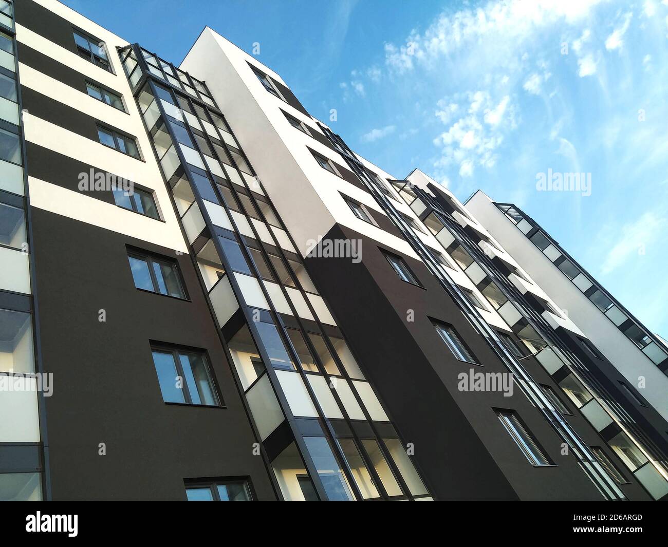 Fragment of modern building opposite blue sky Stock Photo - Alamy