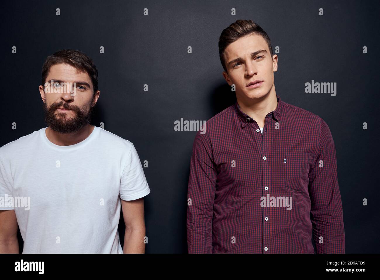 Two drunk friends drinking beer rest fun dark background Stock Photo ...
