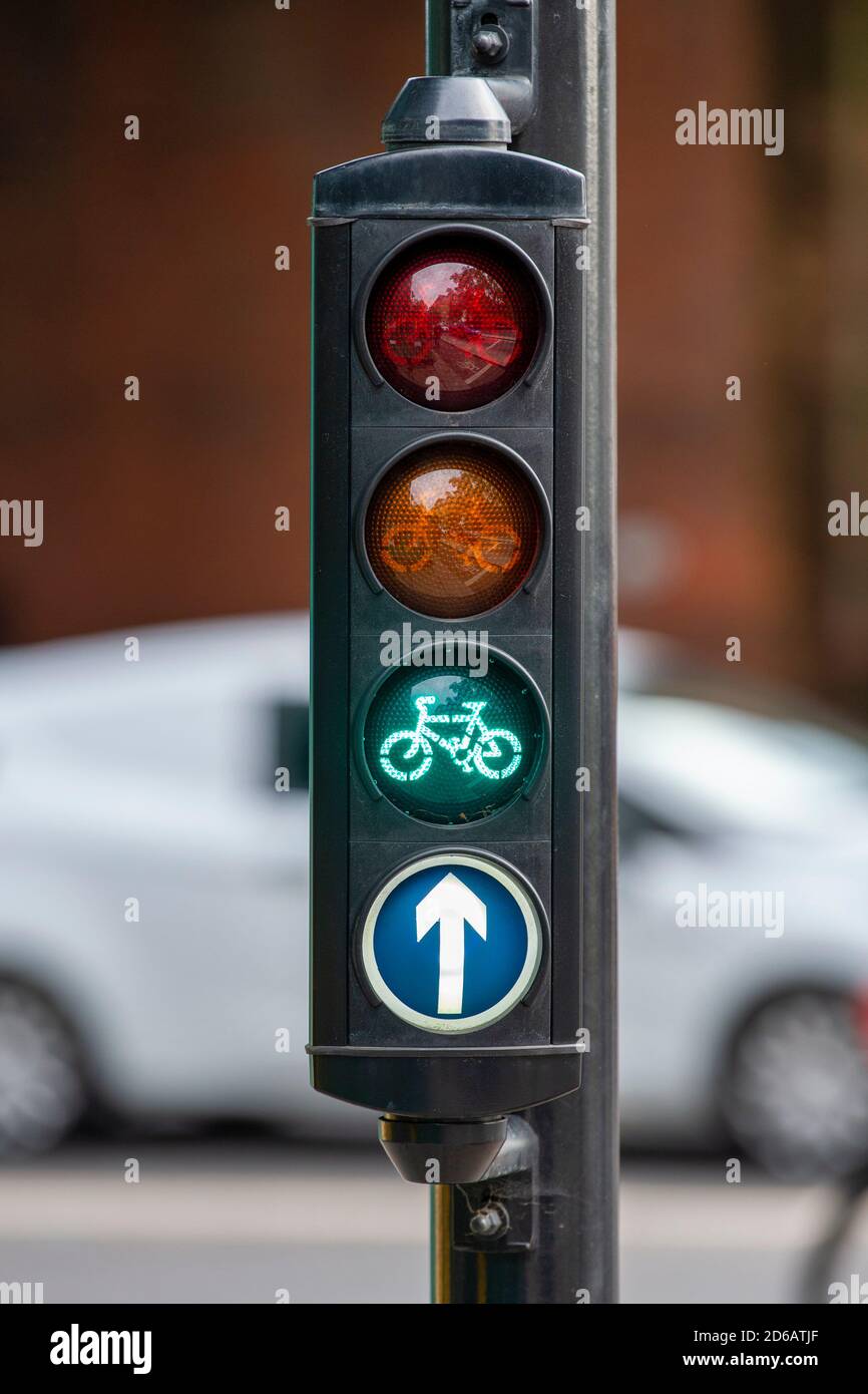 Cycle lane traffic lights showing green seen in London Stock Photo - Alamy