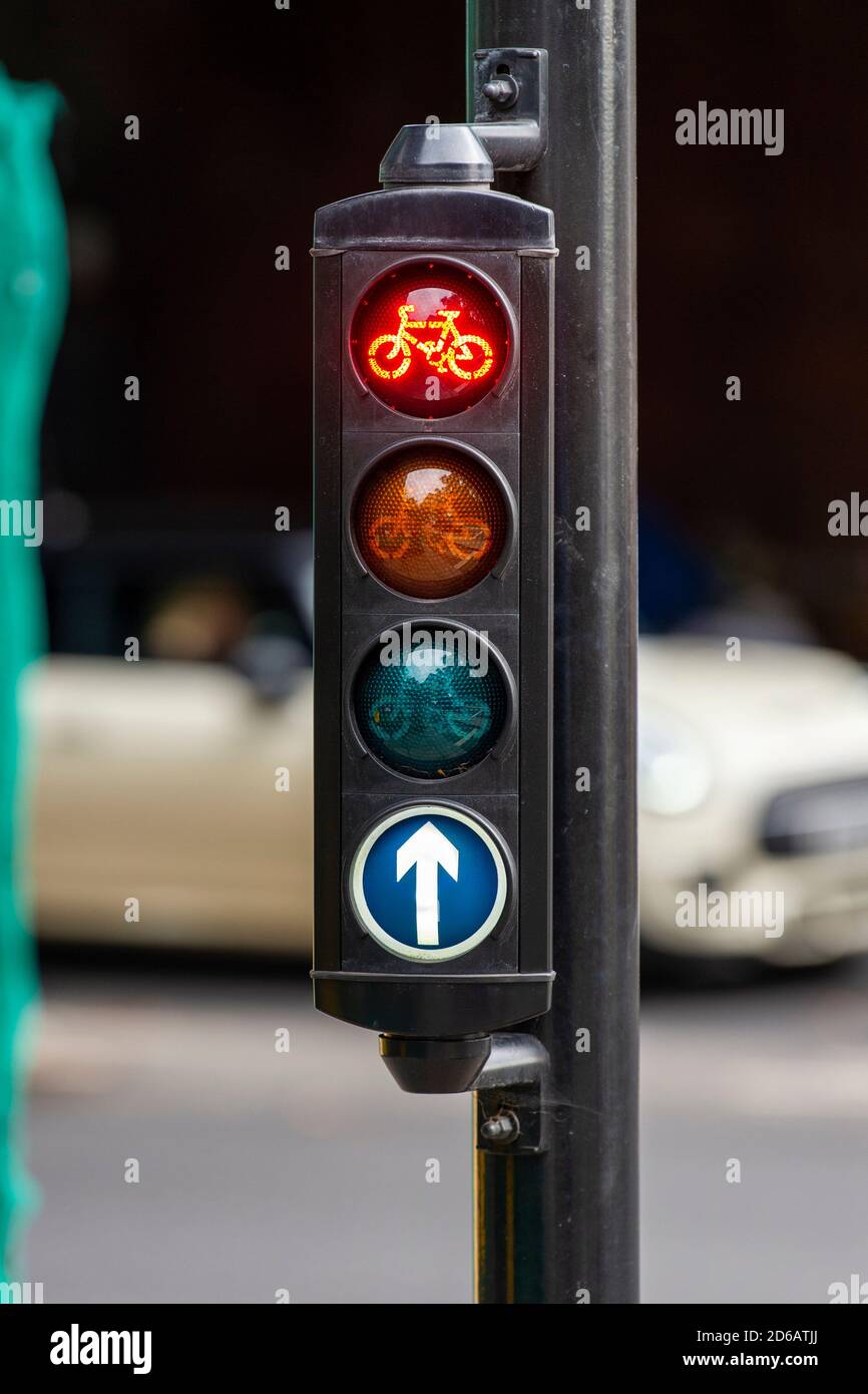 Cycle lane traffic lights showing red seen in London Stock Photo - Alamy