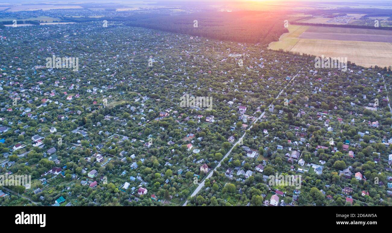 View of the suburban village on the outskirts of the city from a height ...
