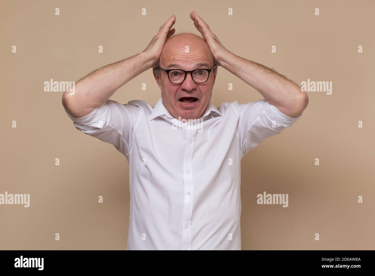 scream of shocked and scared young man Stock Photo - Alamy